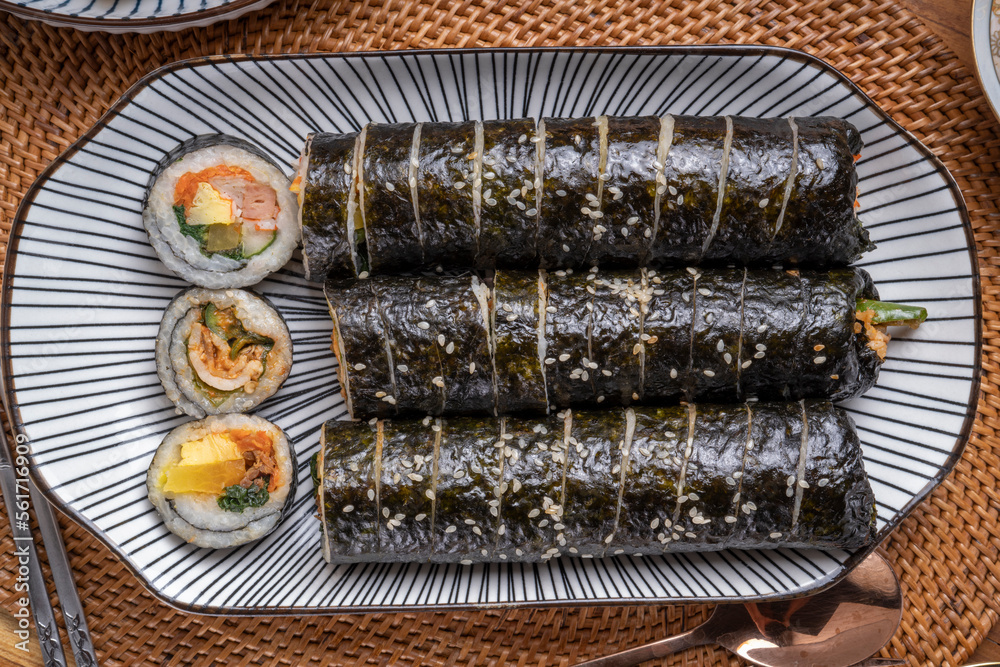 Korean Seaweed Rice Rolls or Kimbap Korean dish made from cooked rice vegetables, meats that are ...