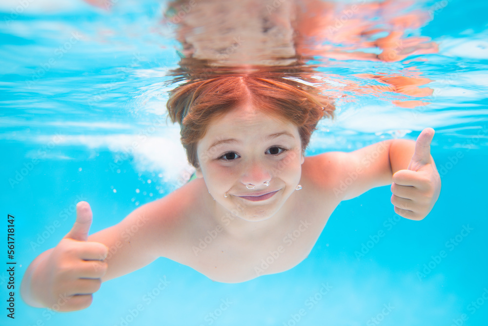 Kids Swimming Underwater