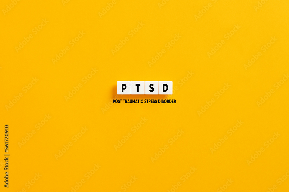 White letter blocks on yellow background with the acronym PTSD post ...