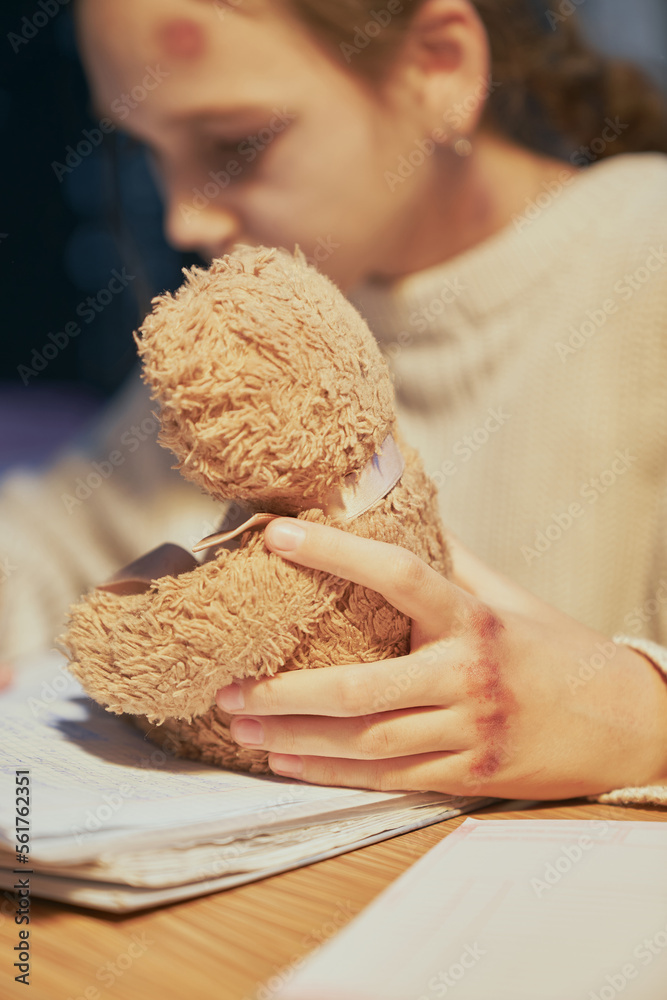 The concept of domestic abuse of a child. Cropped shot of a little girl ...