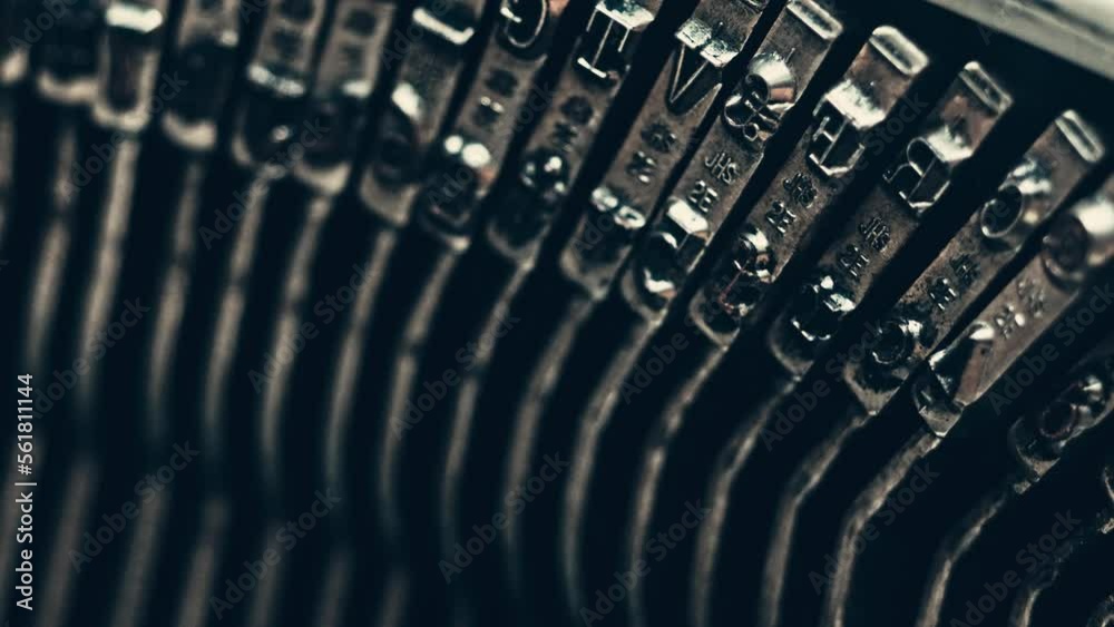Letters and numbers in the typo keys of a old typewriter typing on a ...
