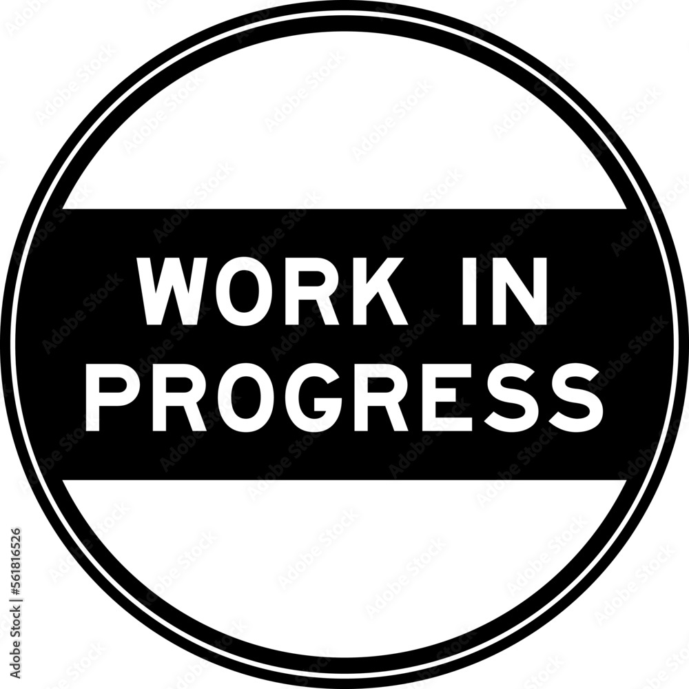 Black color round seal sticker in word work in progress on white ...