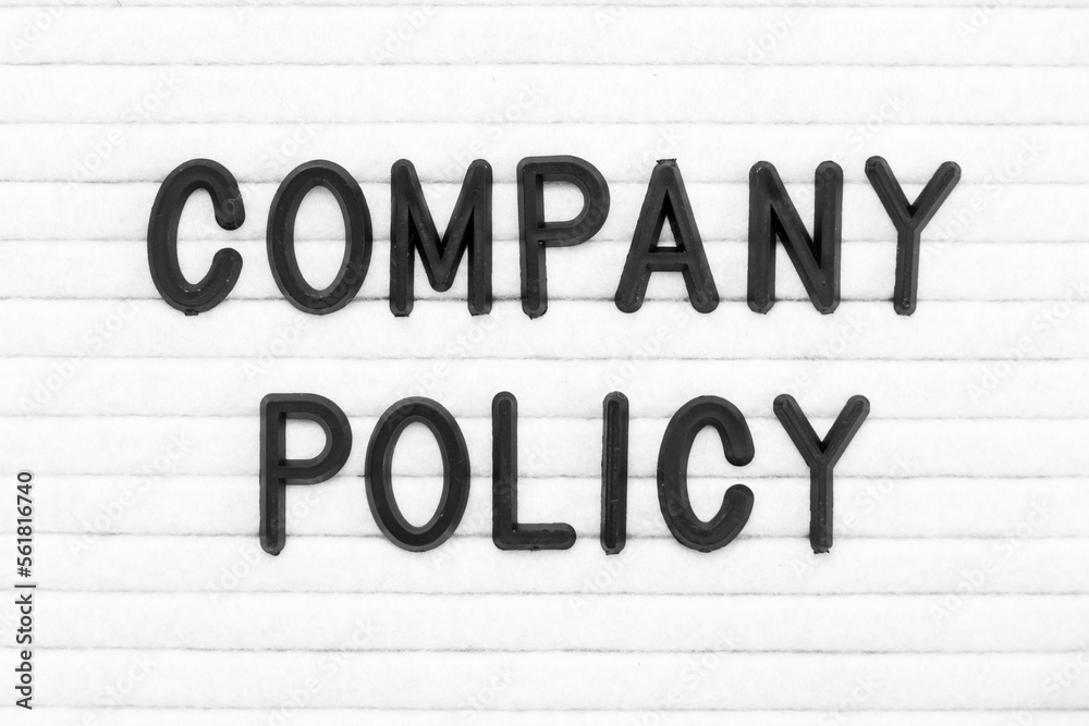 Black color letter in word company policy on white felt board ...