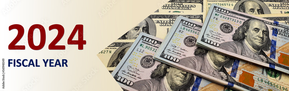 Text "fiscal year 2024" and photo of 100 US dollar banknotes. new ...