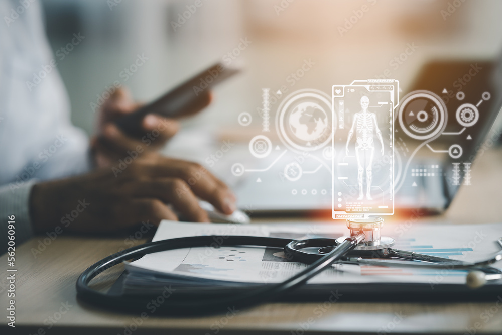 Doctor working on virtual screen digital chart with stethoscope ...