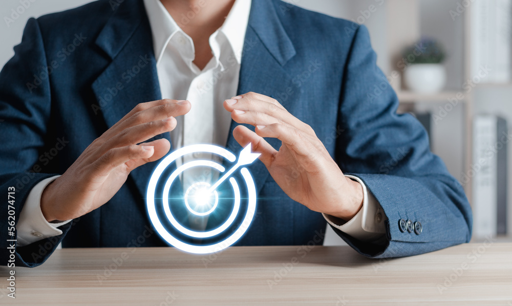 Startup business. Target icon in businessman hand. Goal Setting concept ...