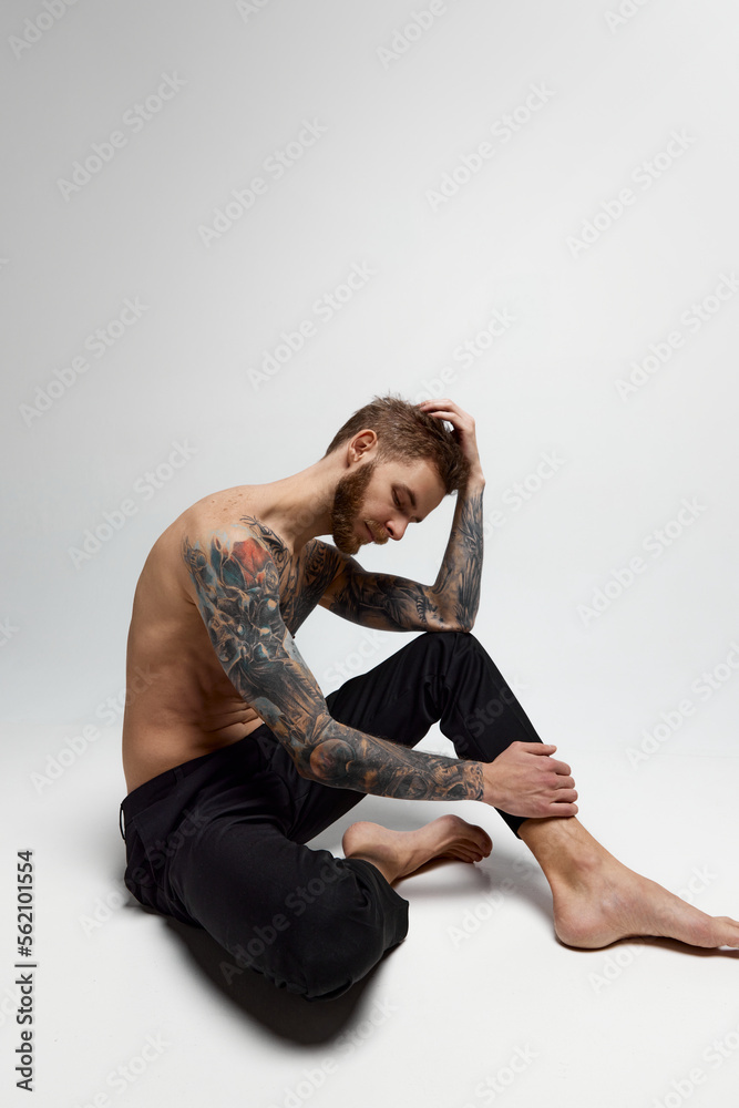 Stylish handsome young man posing shirtless. Textured muscular body ...