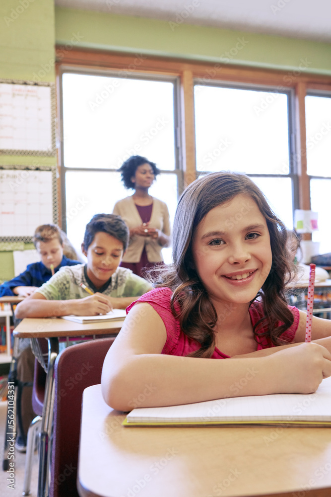 Happy, students and portrait of girl in classroom with notebook for ...