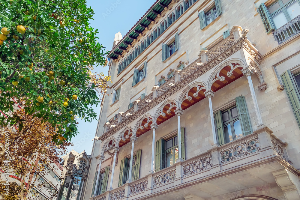 Bottom view of the facade with a balcony of the Casa Vidua Marfa ...