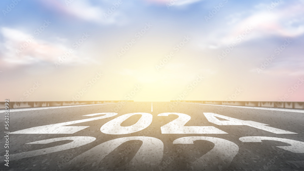Numbers 2023 and 2024 written on empty road. Concept of change 2023 on ...