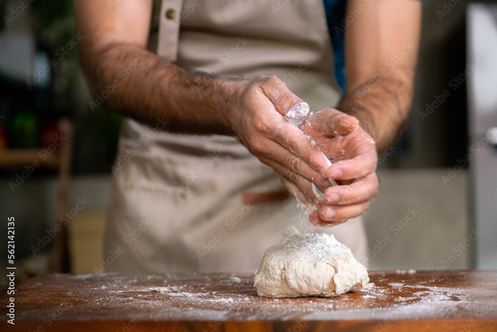 professional chef thresh flour white powder on wood table for sweet ...