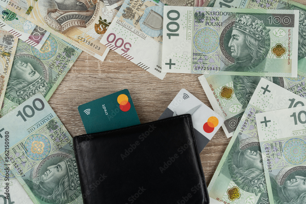 Mastercard debit and credit card in a wallet. Payment cards used for ...