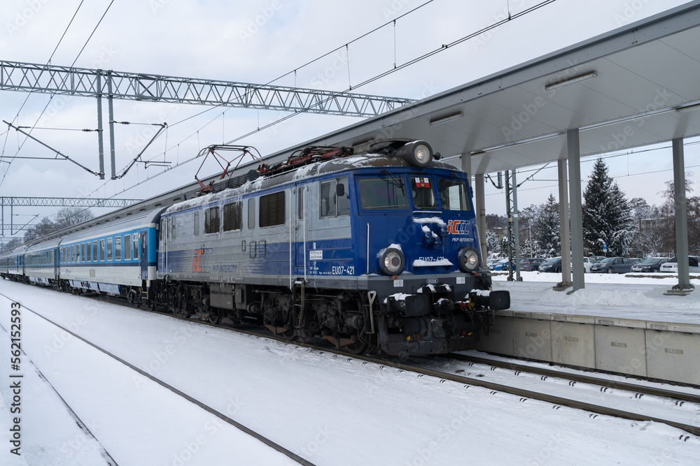 PKP Intercity EU07 electric locomotive with passenger cars. Long ...