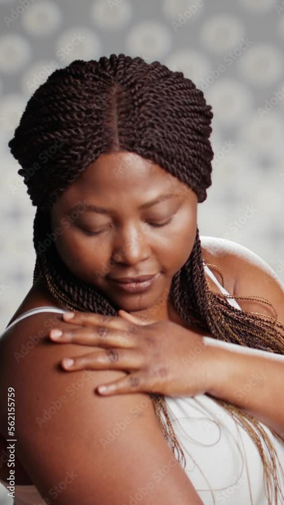 Vertical Video African American Girl Feeling Radiant Applying Cream In
