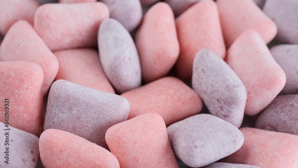Colored chewing gum. Pink and purple chewing gum close up Stock Photo ...