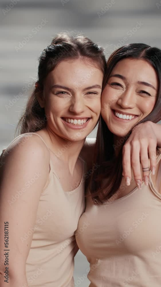 Vertical video: Diverse friends laughing and feeling positive on camera ...