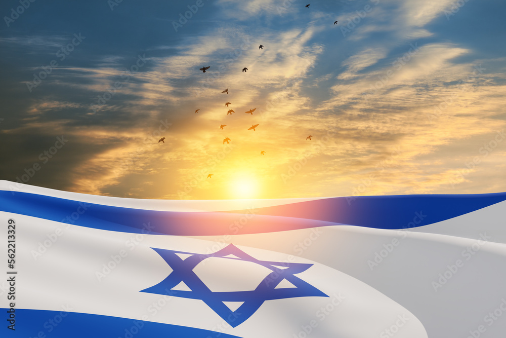 Israel flag with a star of David over cloudy sky background with flying ...