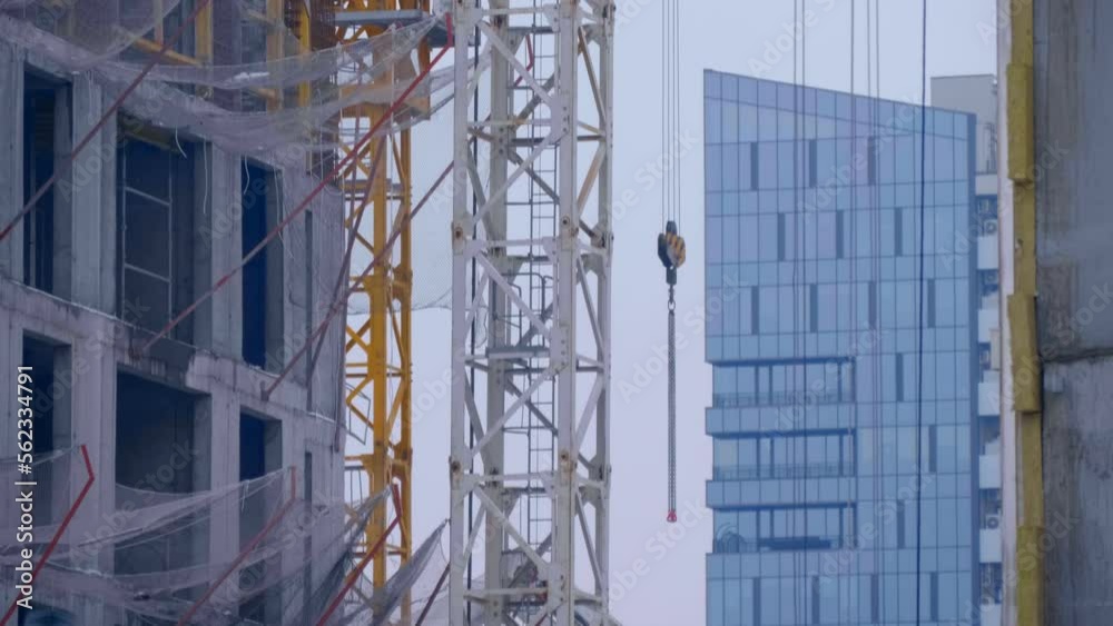 Construction site, where a modern beautiful multi-storey building is ...
