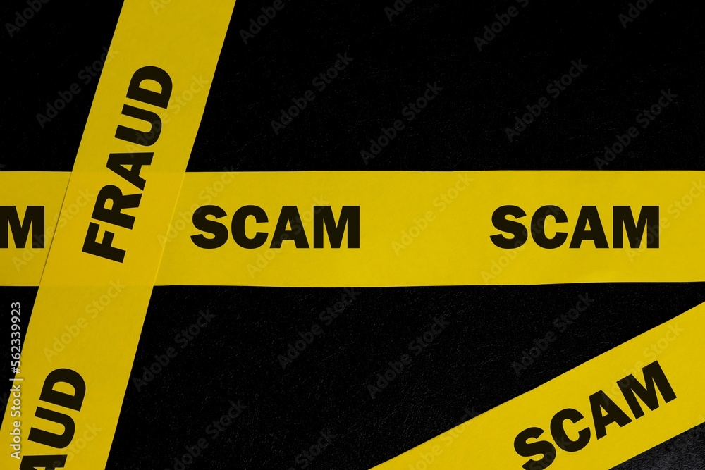 Scam and fraud alert, caution and warning concept. Yellow barricade ...