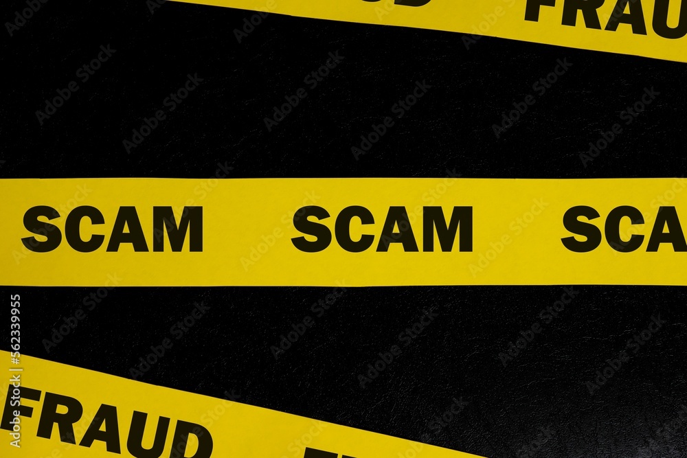 Scam and fraud alert, caution and warning concept. Yellow barricade ...