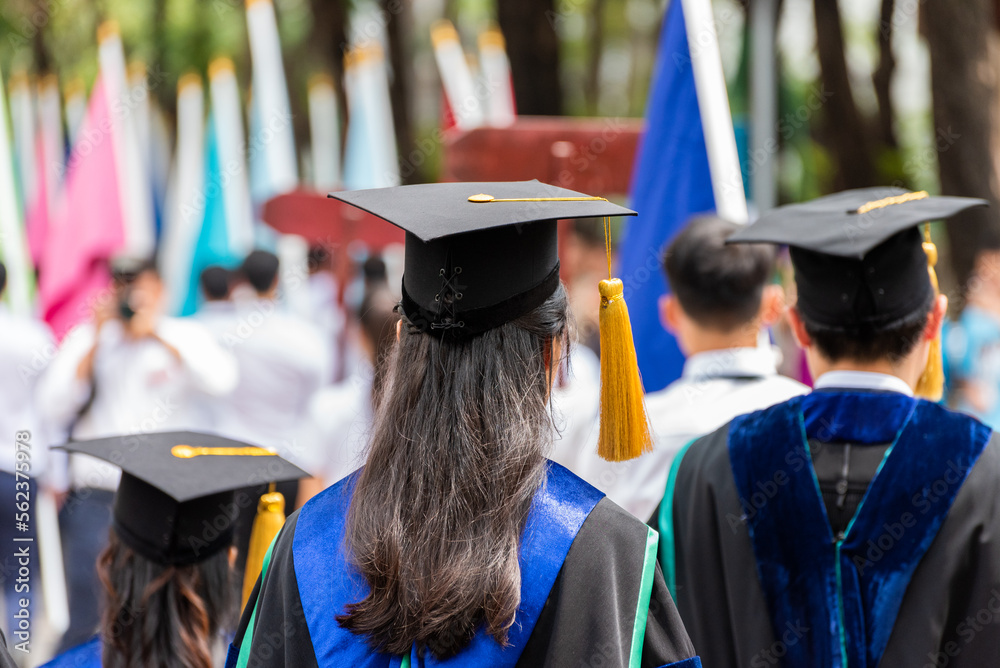 Back side view higher education graduation of graduates during ...