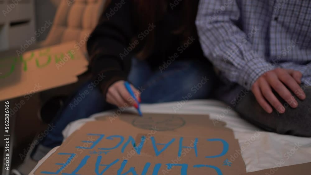 Video Stock two student activists prepare posters in the dorm room ...