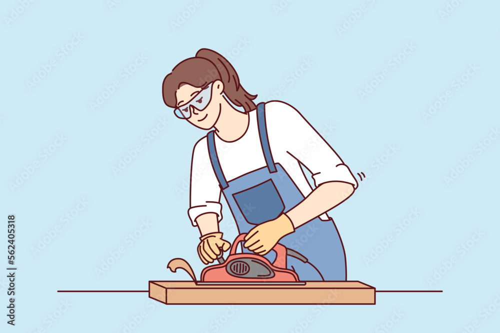 Woman furniture maker uses jointer to process wooden planks needed to ...