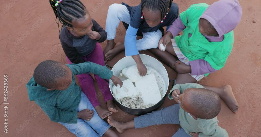 Poverty in Africa. Small group of starving Black African children ...