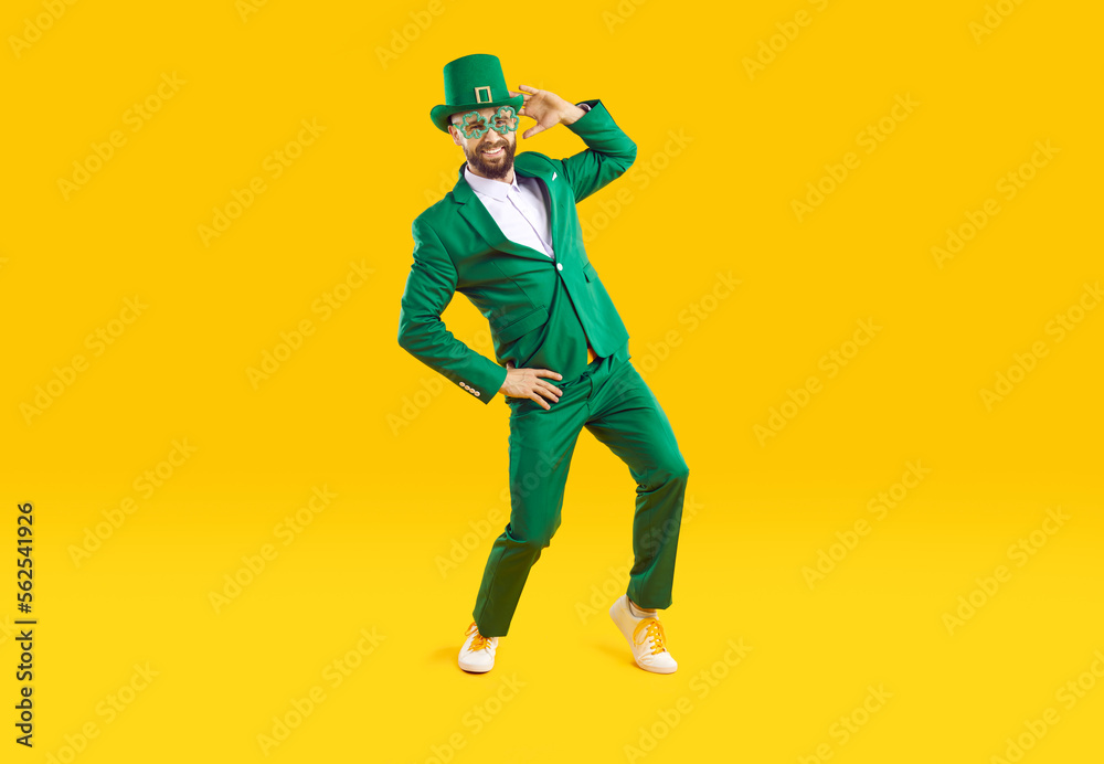 Happy St. Patrick's Day. Funny stylish man in green clothes celebrates ...