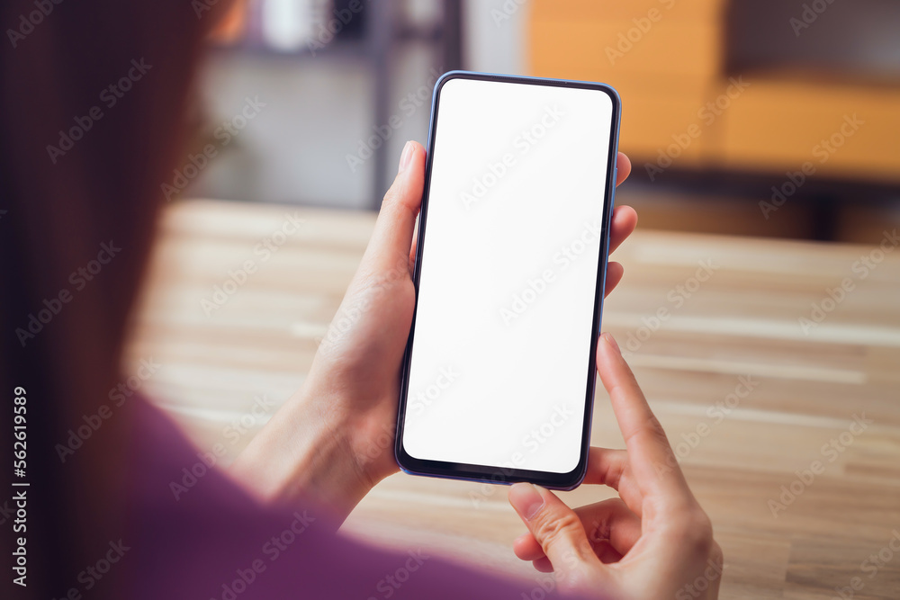 Hand holding digital smartphone mockup of blank screen. Take your ...