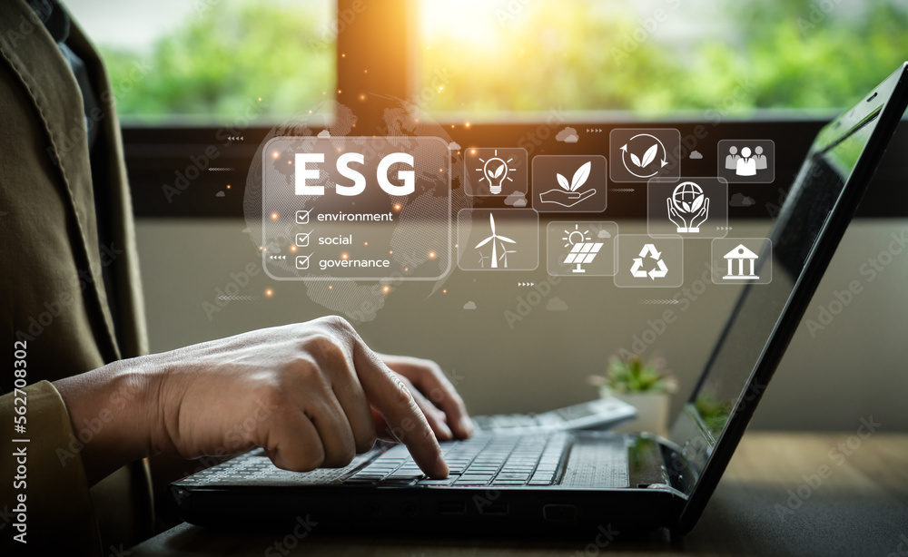 ESG environment social governance investment concept. Businessman using ...
