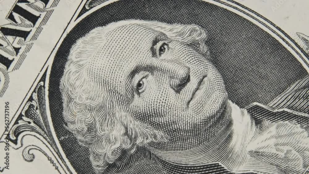 The portrait of George Washington on the one dollar bill rotates close ...