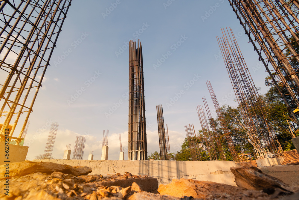 Bored pile, Tall steel rods tied to the frame structure for strength ...