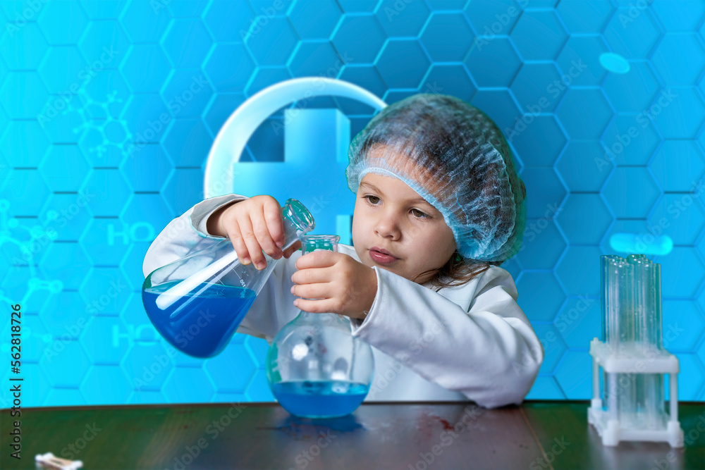 Little kid doing experiments with blue liquid. Cute child wants to ...