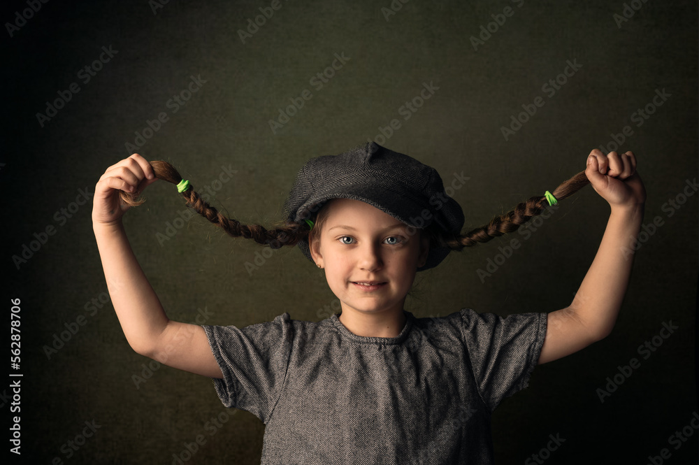 Portrait of a cute little girl with pigtails Stock Photo | Adobe Stock