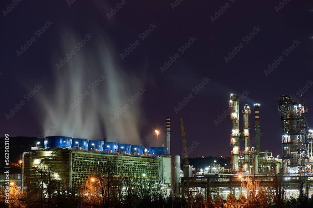 Cooling towers and chimneys of the refinery in the municipality ...