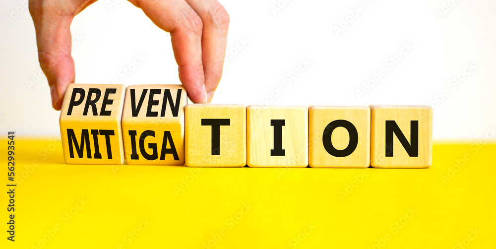 Prevention or mitigation symbol. Businessman turns cubes and changes ...
