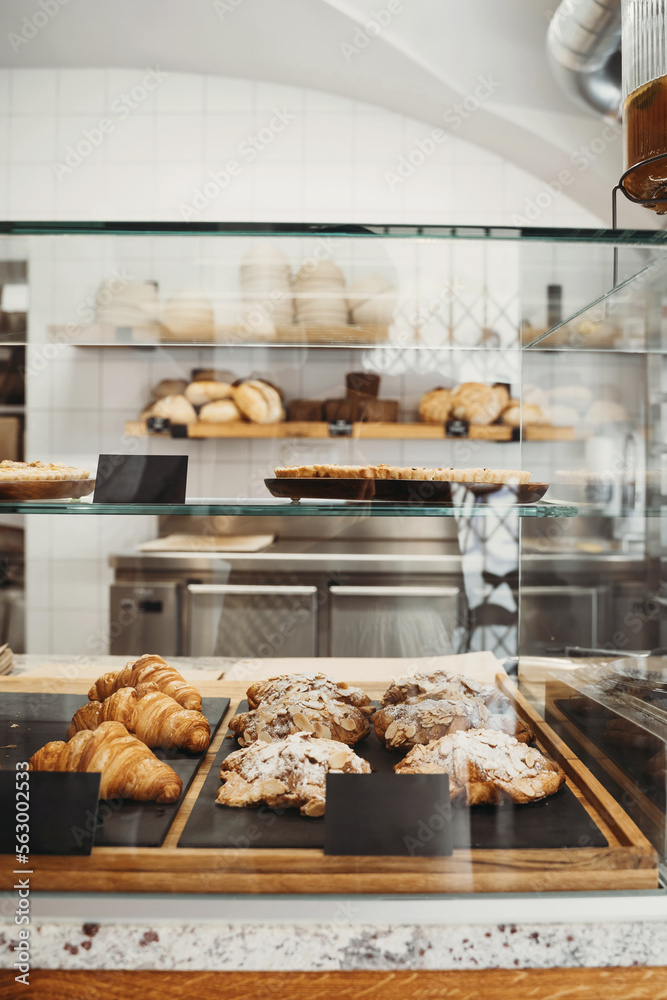 Interior details at the bakery and coffee shop. Bistro showcase with ...