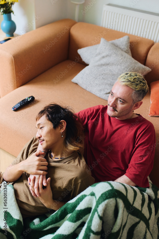 Young Happy Asian And Caucasian Same Sex Interracial Couple At Home