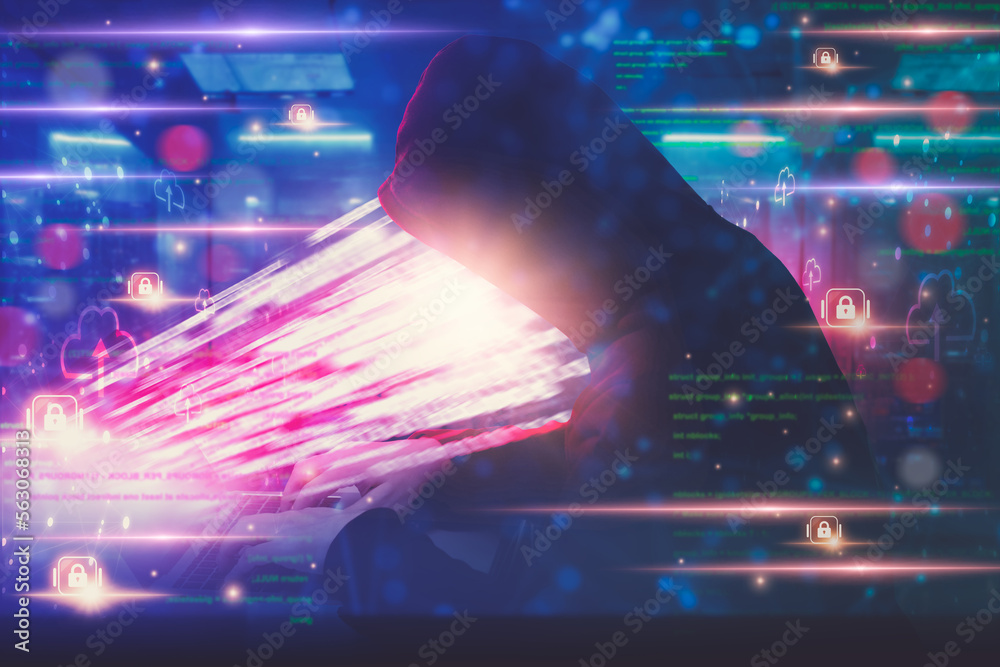 Hacker in hoodie attack laptop computer,dangerous data server and Infects system, binary code ...