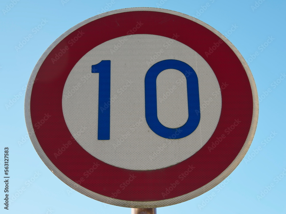 Tokyo, Japan - January 20, 2023: Traffic sign of speed limit on blue ...