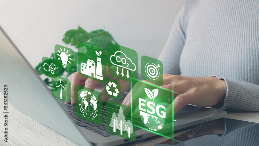 Women use a laptop computer to analyze ESG icon.plan to renewable ...