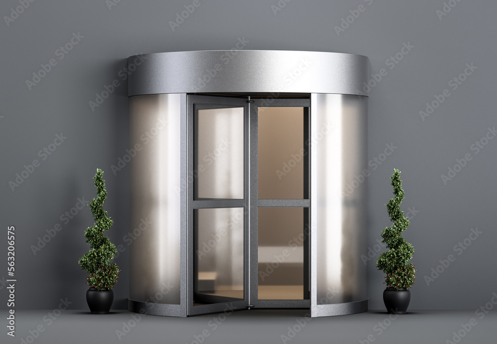 A glass revolving door used in modern mall, office or skyscraper ...