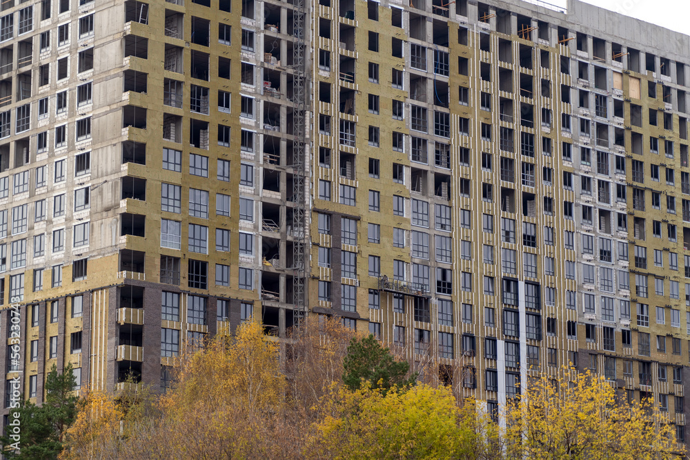 Installation of external wall thermal insulation with rock wool ...