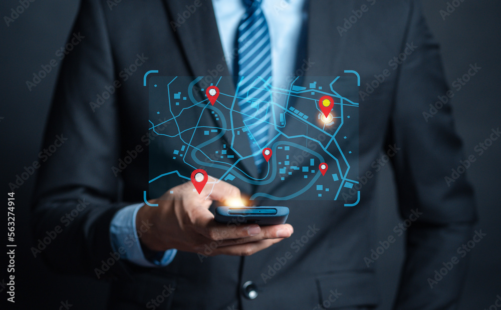 Businessman using smartphone searching world map with location point ...