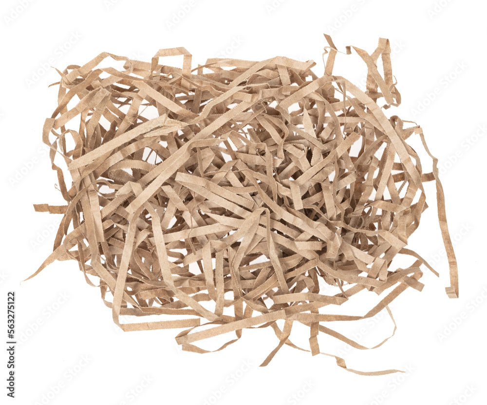 Kraft paper shavings isolated on white background. gift box filler ...