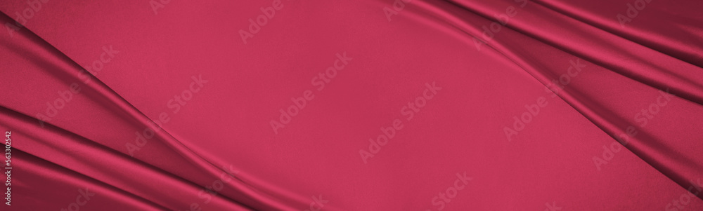 Raspberry red silk satin. Viva magenta. Color 2023. Draped fabric ...