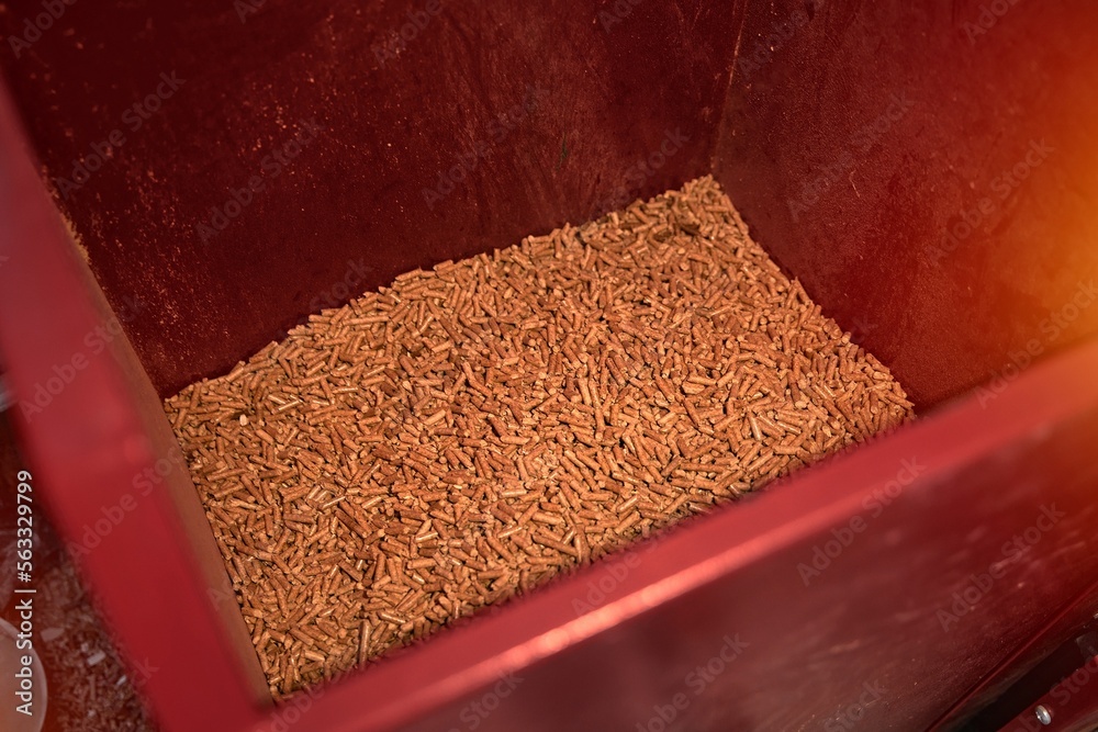 Pellet oven filled with pile and oak wooden 6mm pellet. Eco fuel for ...