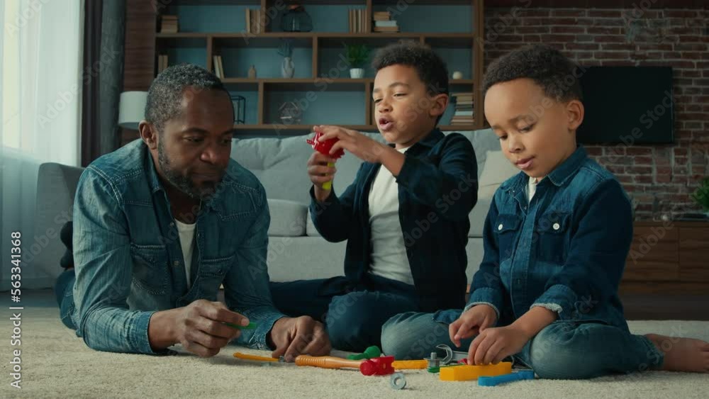 African American Ethnic Man Father With Two Little Preschool Sons Boys