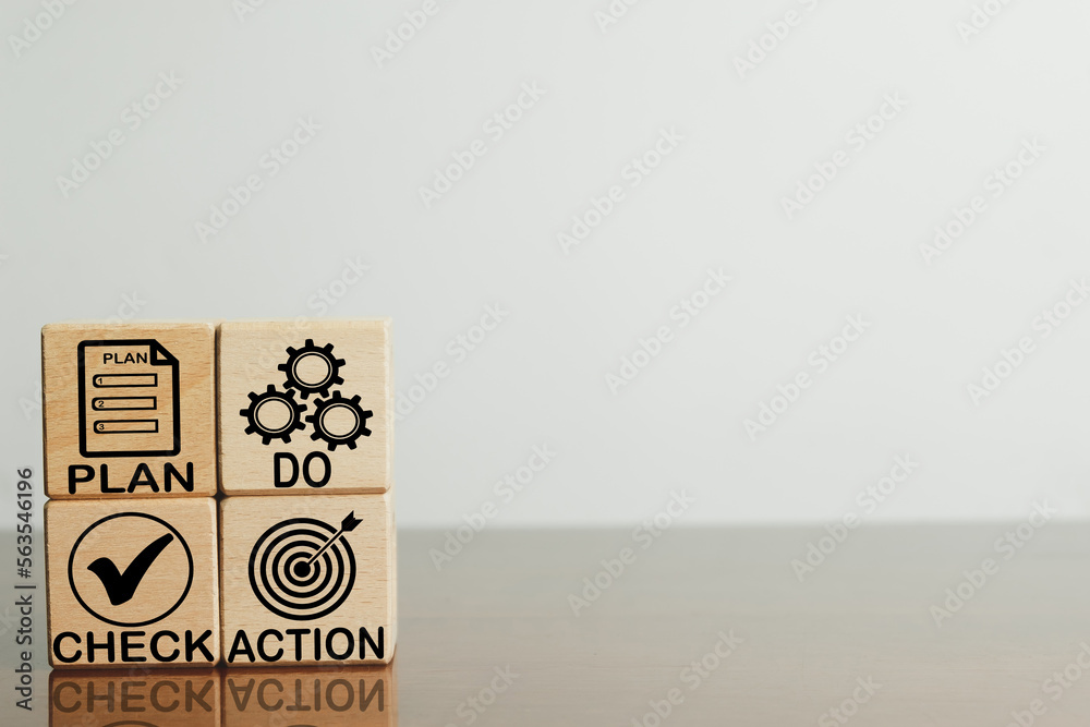 Image of wooden cubes stack with plan,do,check,action icon and word ...